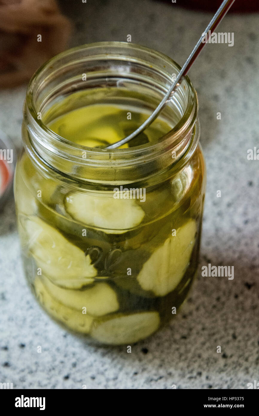 pickles in a clear glass jar Stock Photo - Alamy