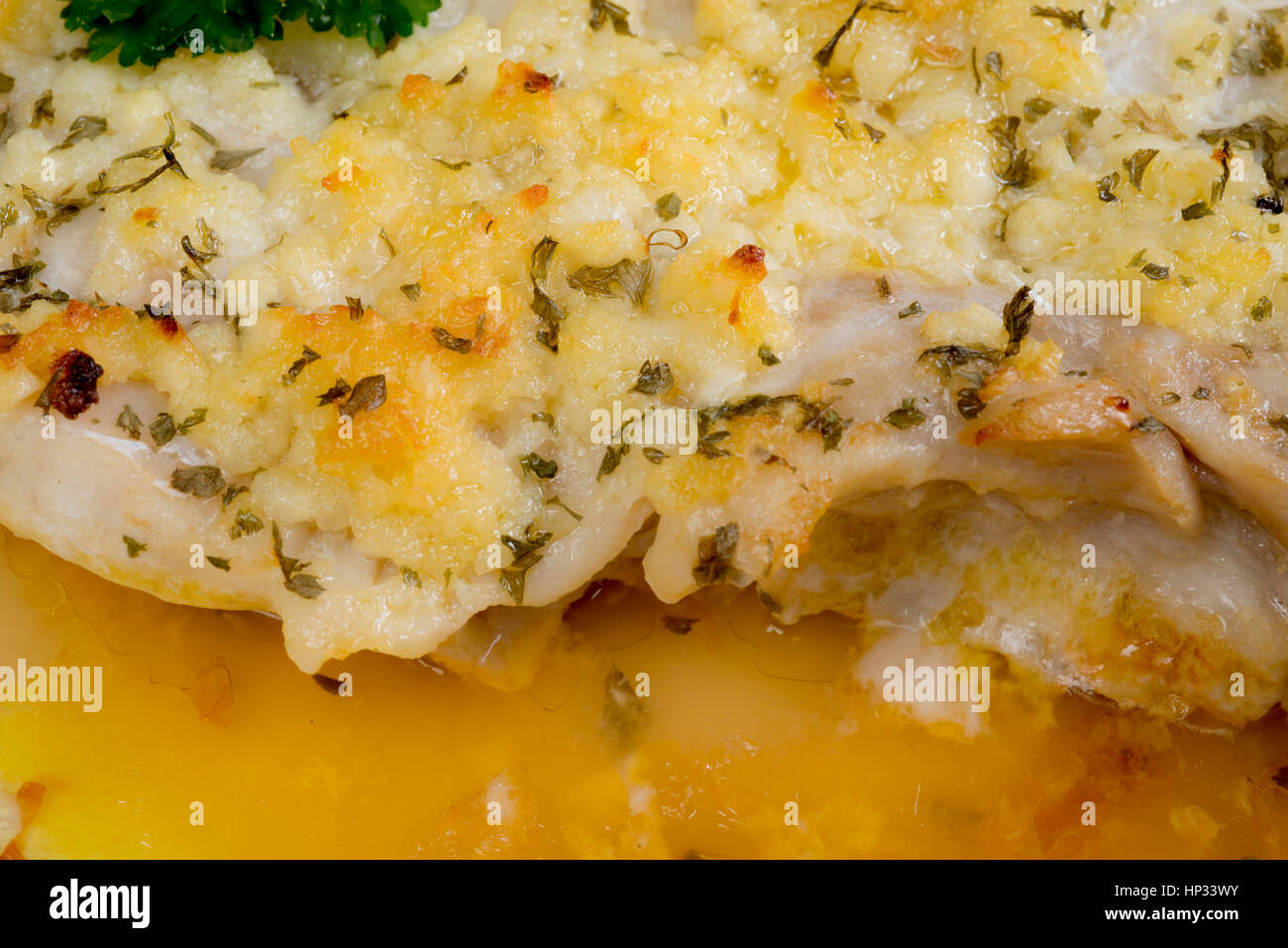 cooked grouper close up with garlic butter Stock Photo - Alamy