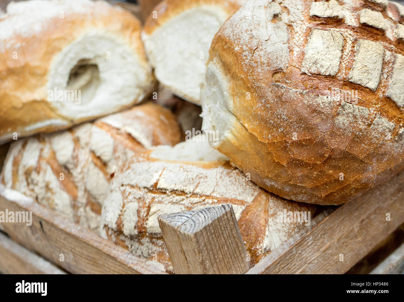 Fresh, crisp bread in a wooden crate Stock Photo - Alamy