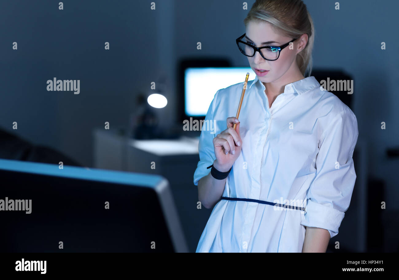 Surprised young secretary working in the office Stock Photo - Alamy