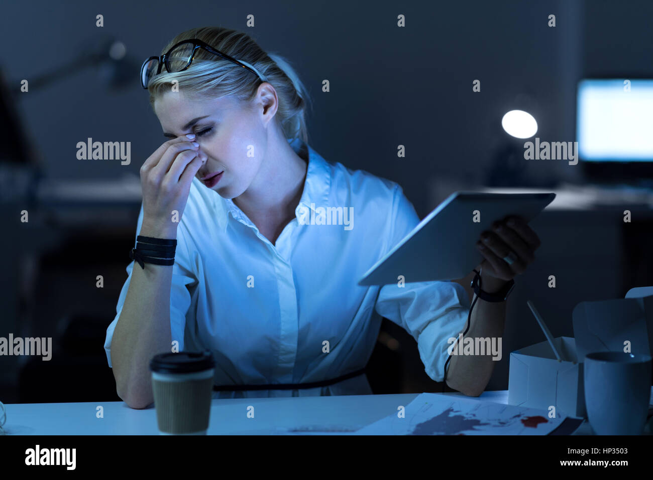 Depressed programmer feeling weakened in the office Stock Photo - Alamy