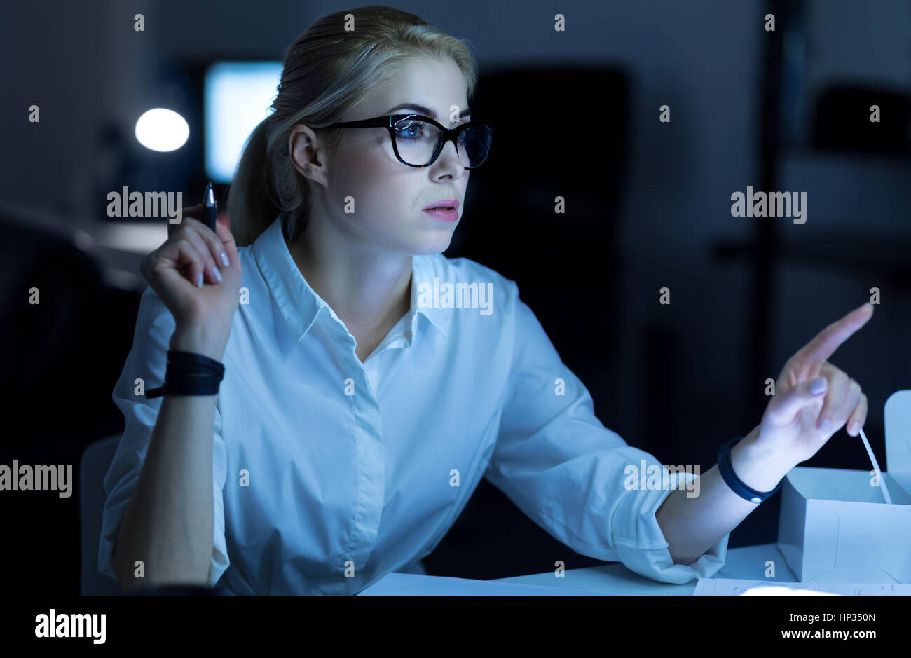 Pretty female hacker breaking into the computer system Stock Photo - Alamy