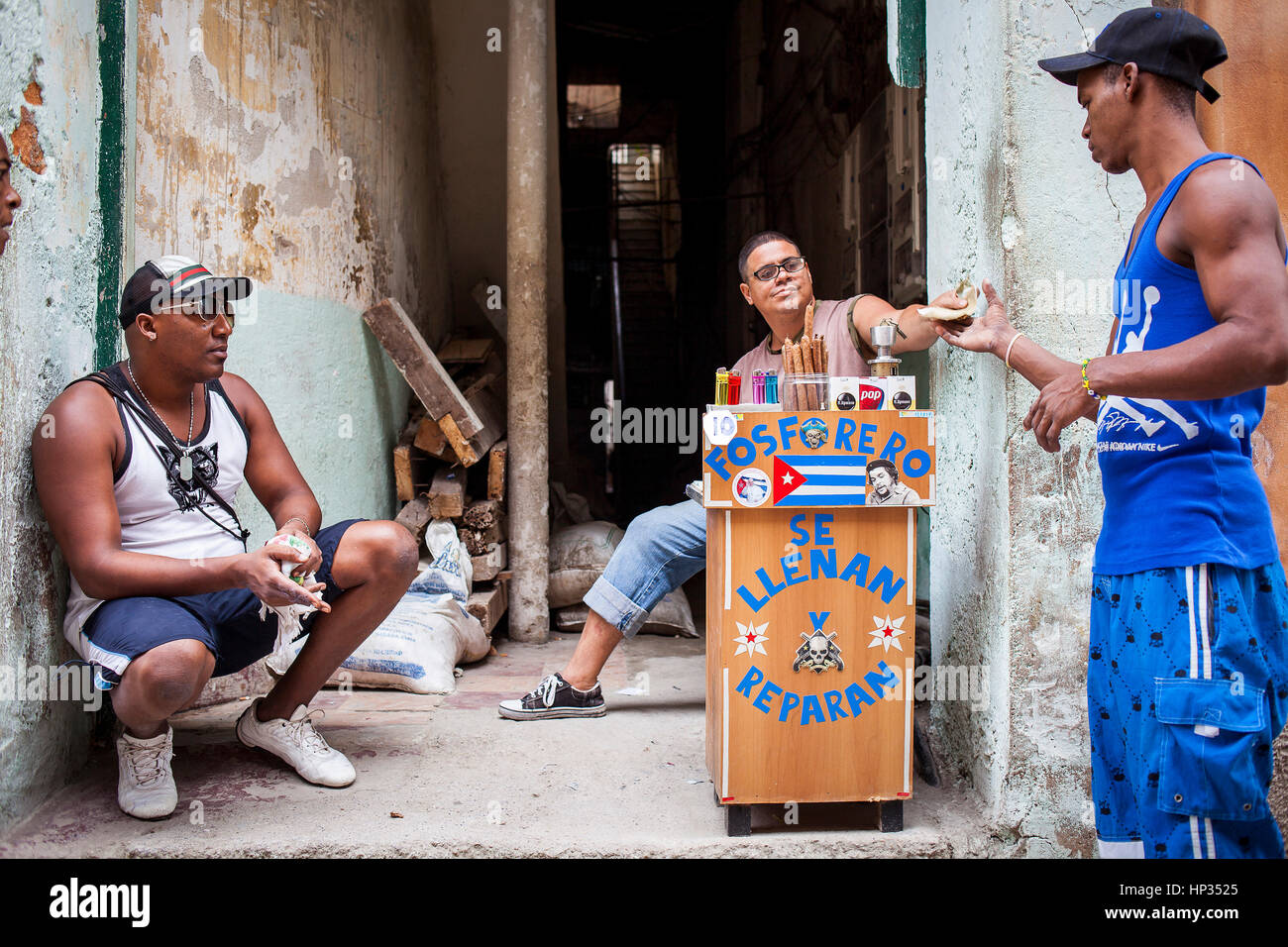 `Fosforero´ man,selling, reparing, filling lighters. Also selling ...