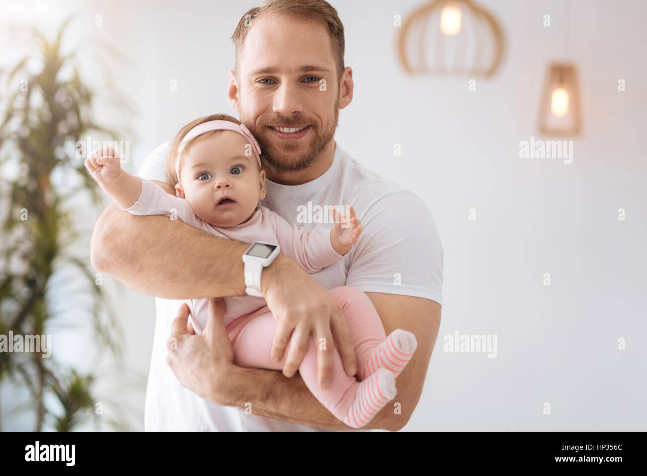 Amused kid girl having fun with her father Stock Photo - Alamy