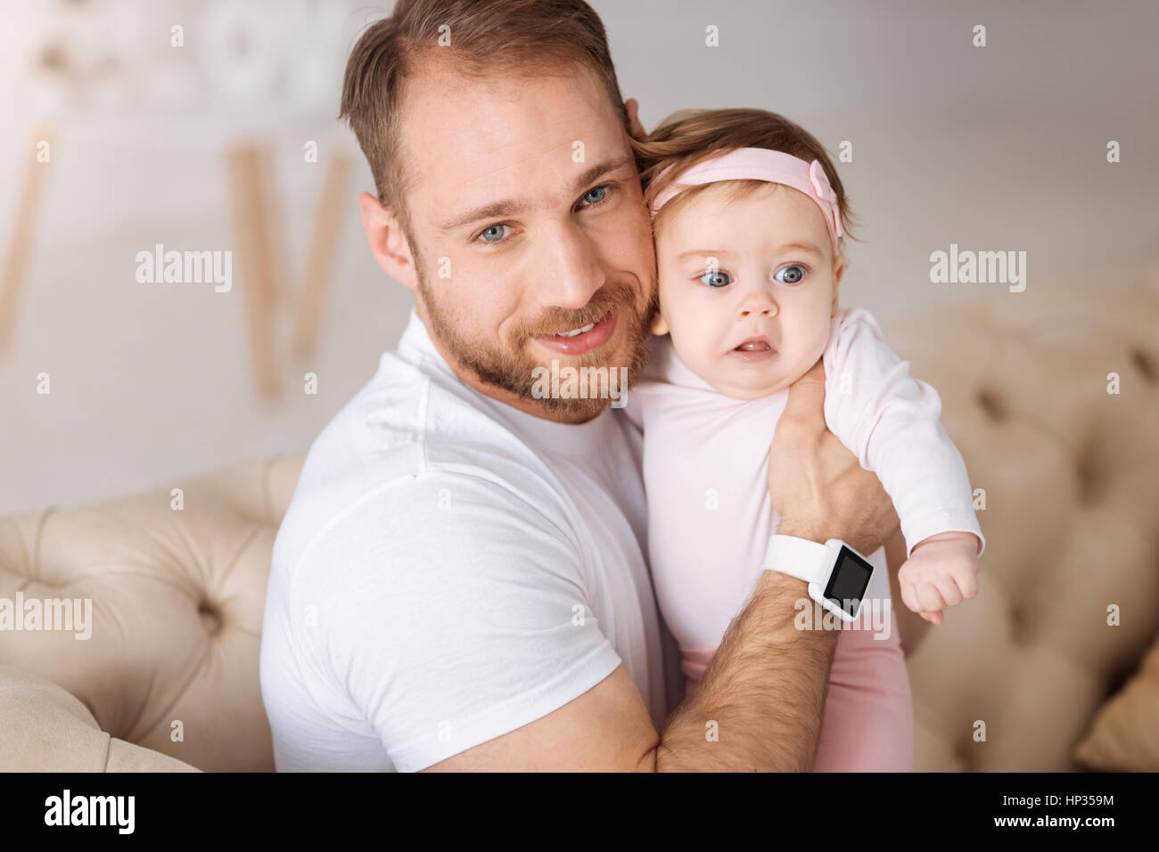 Positive father expressing love to his kid at home Stock Photo - Alamy