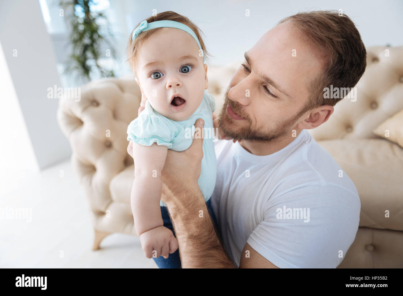 Adorable toddler girl spending weekend with the father at home Stock ...