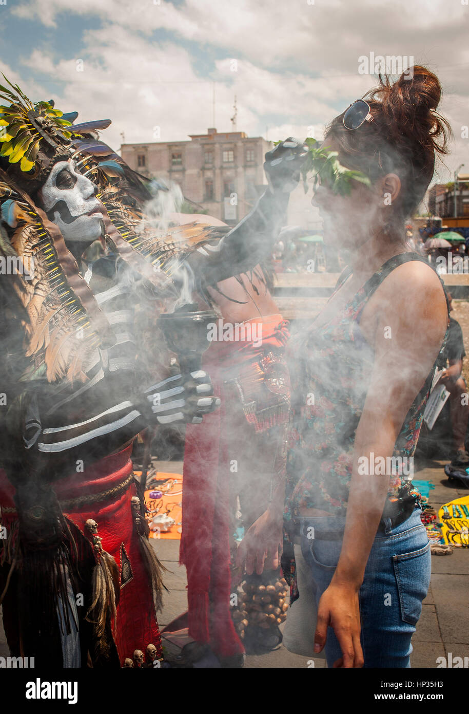 Aztec folk healer, shaman practising spiritual cleansing,Plaza de la ...