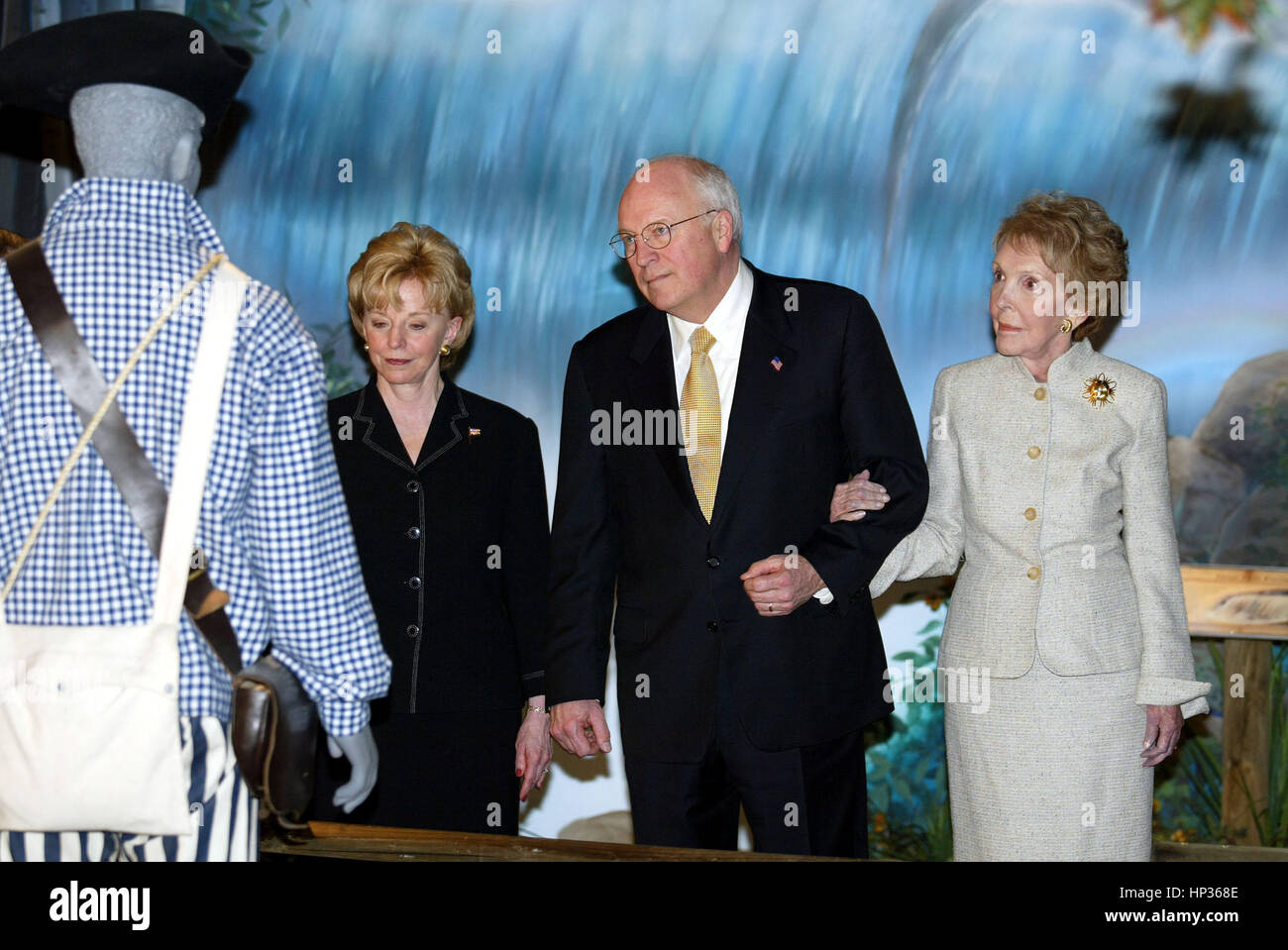 Vice President Dick Cheney, (C) looks at a display for York, a black ...