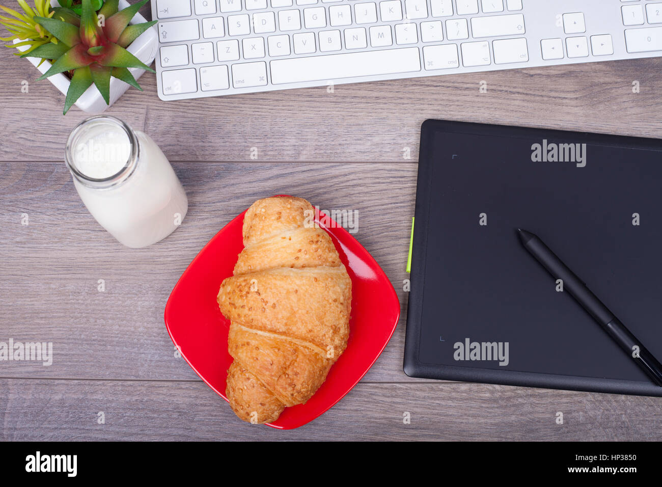 Keyboard and breakfast on a wooden table from above Stock Photo - Alamy