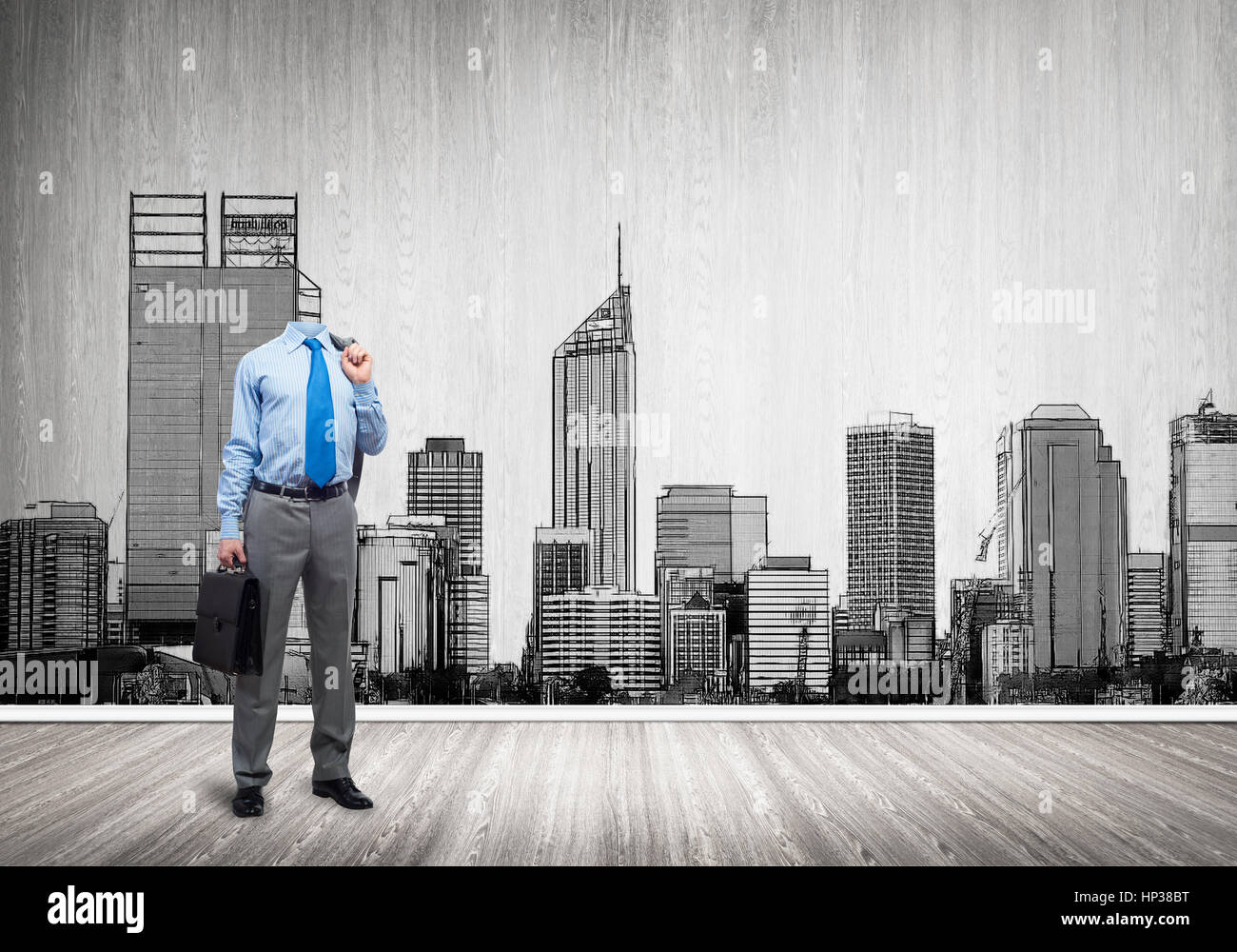Headless engineer man with papers in hand against construction ...