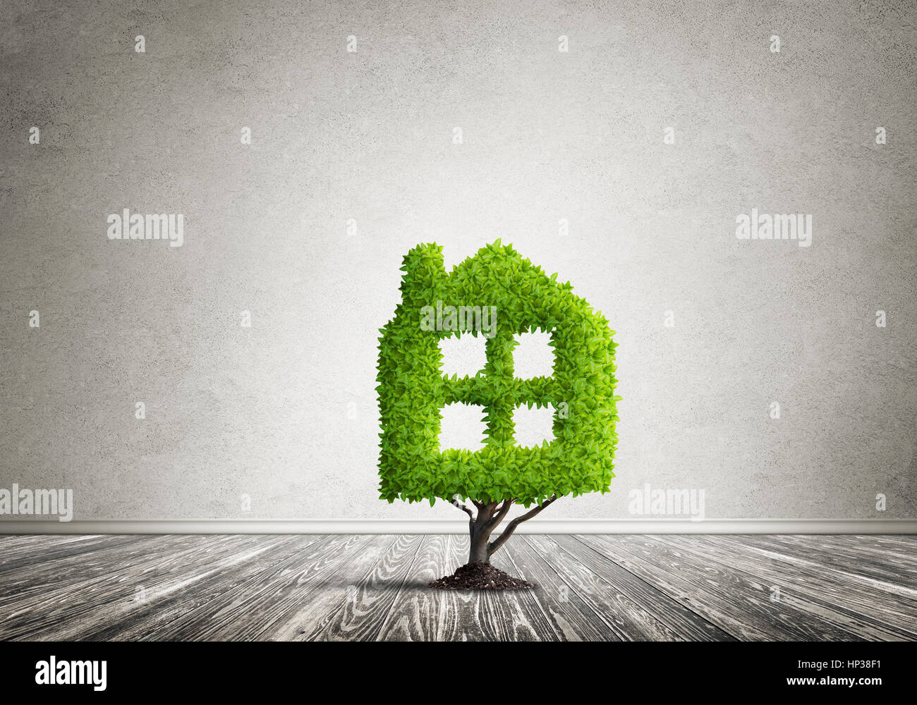 House shaped green tree as real estate concept Stock Photo - Alamy