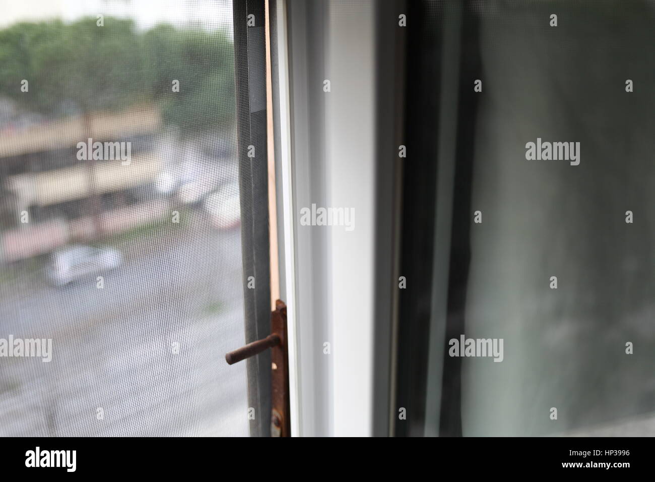 Mosquito net on a PVC window Stock Photo - Alamy