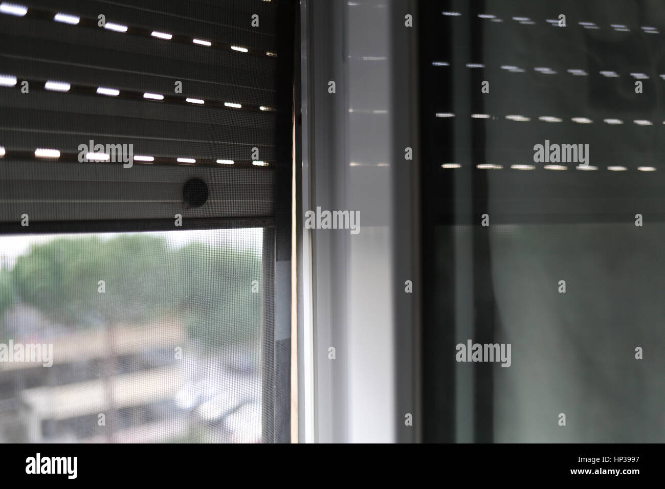 Mosquito net on a PVC window Stock Photo - Alamy