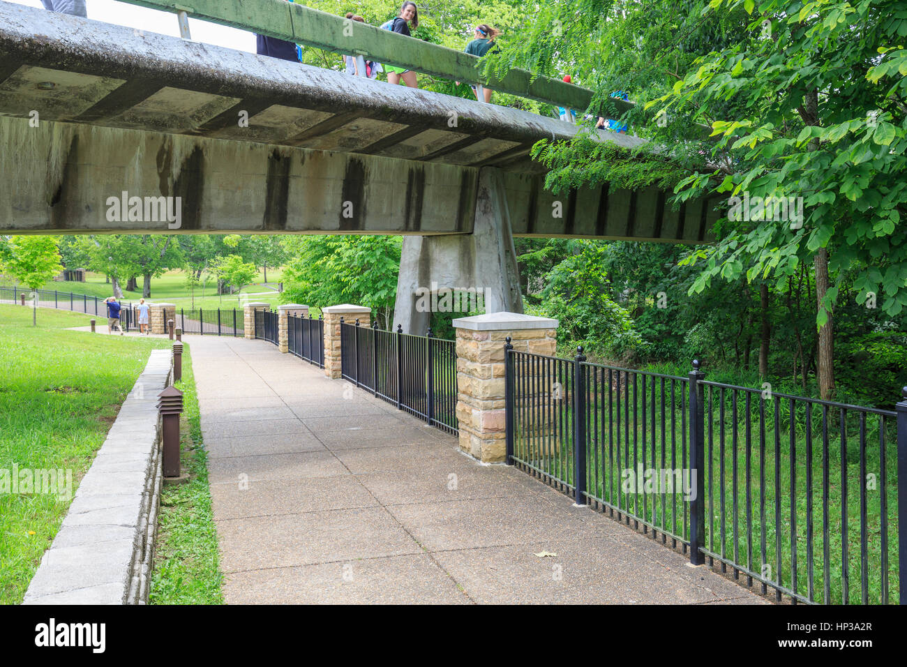 Path to cave tour with overhead pedestrian bridge, Mammoth Cave ...