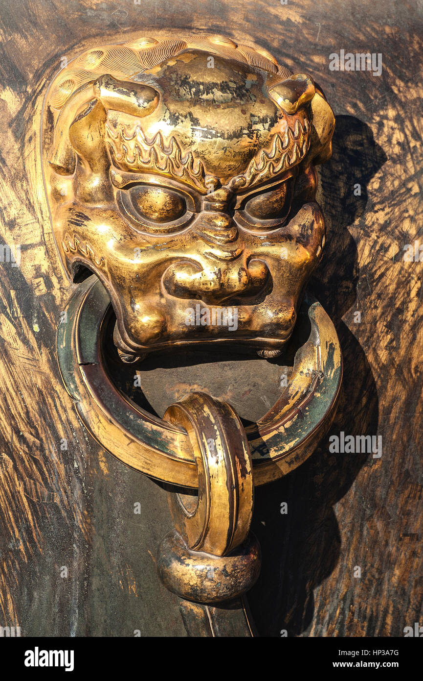 Bronze handle of the water vat in Forbidden City, which used to put out ...