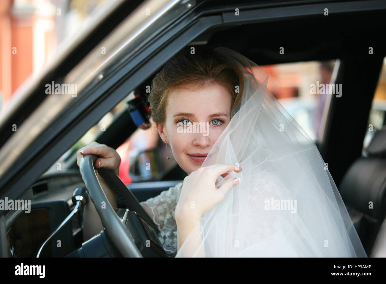 Bride in a car hi-res stock photography and images - Alamy