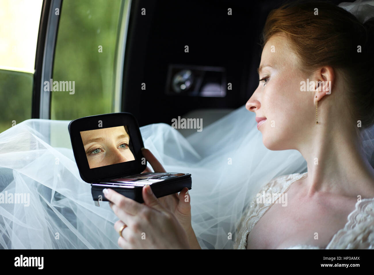 The beautiful bride in the automobile Stock Photo - Alamy