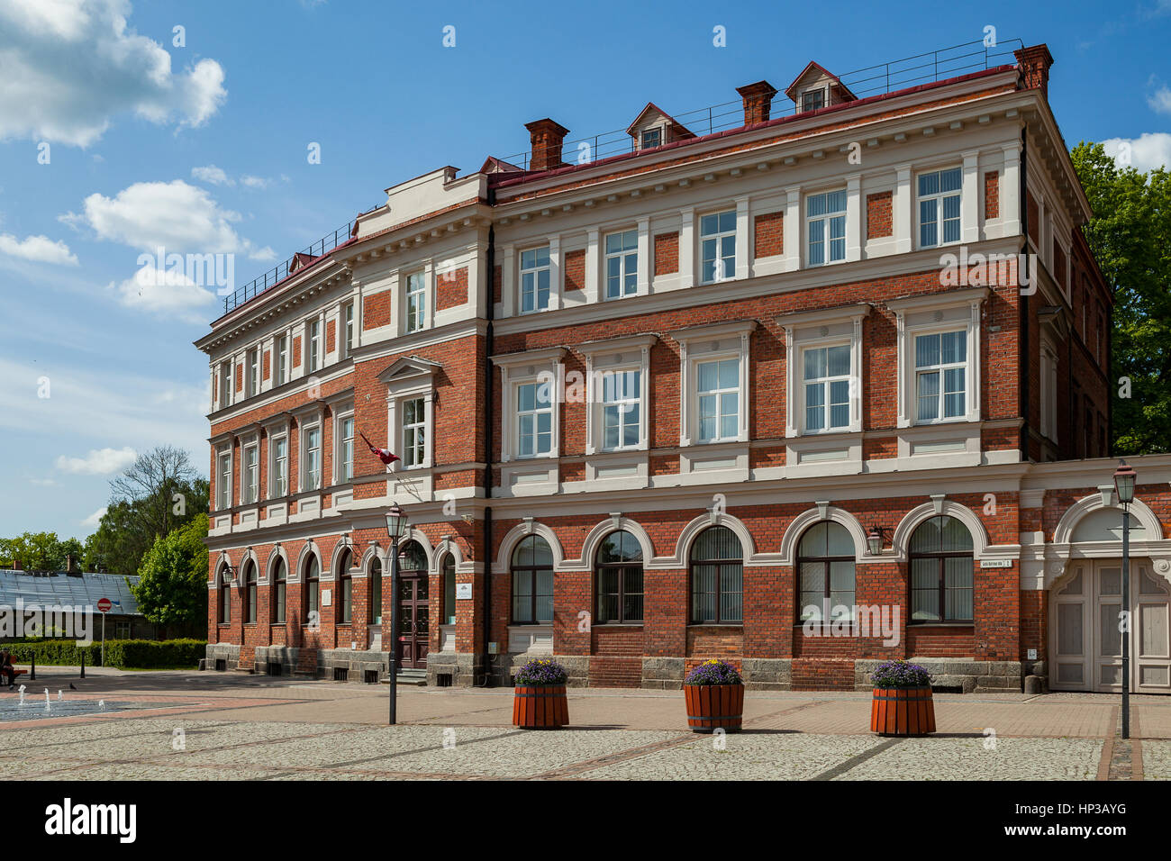 Red brick classic building from 19th century. Bright sunny day in ...