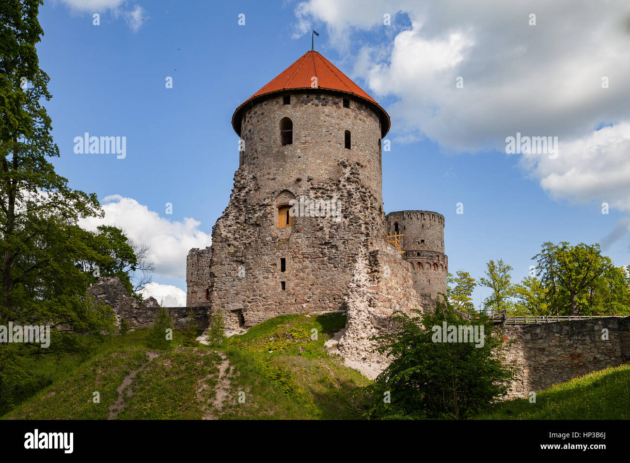 Big tower and beautiful ruins of ancient Livonian castle in old town of ...