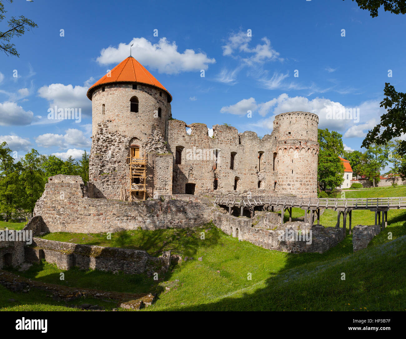 View of beautiful ruins of ancient Livonian castle in old town of Cesis ...