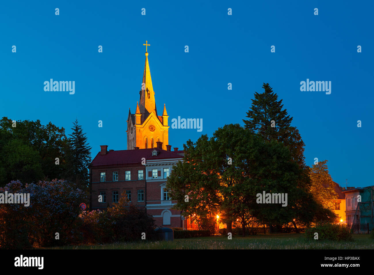 Old town street and church at summer night. Cesis, Latvia Stock Photo ...