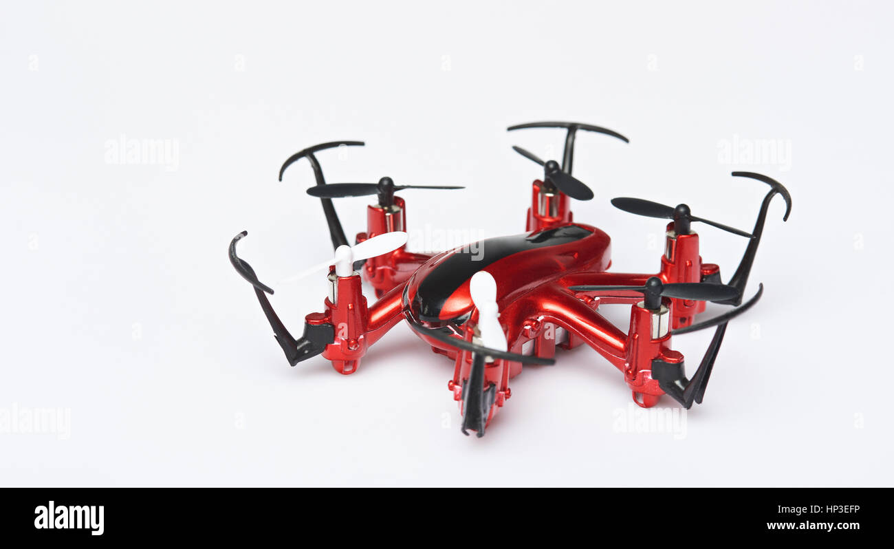 Red copter drone isolated on white background Stock Photo - Alamy