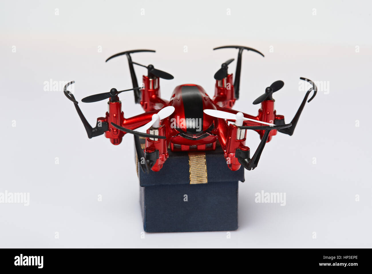 One drone with package box isolated on white background. Express air ...