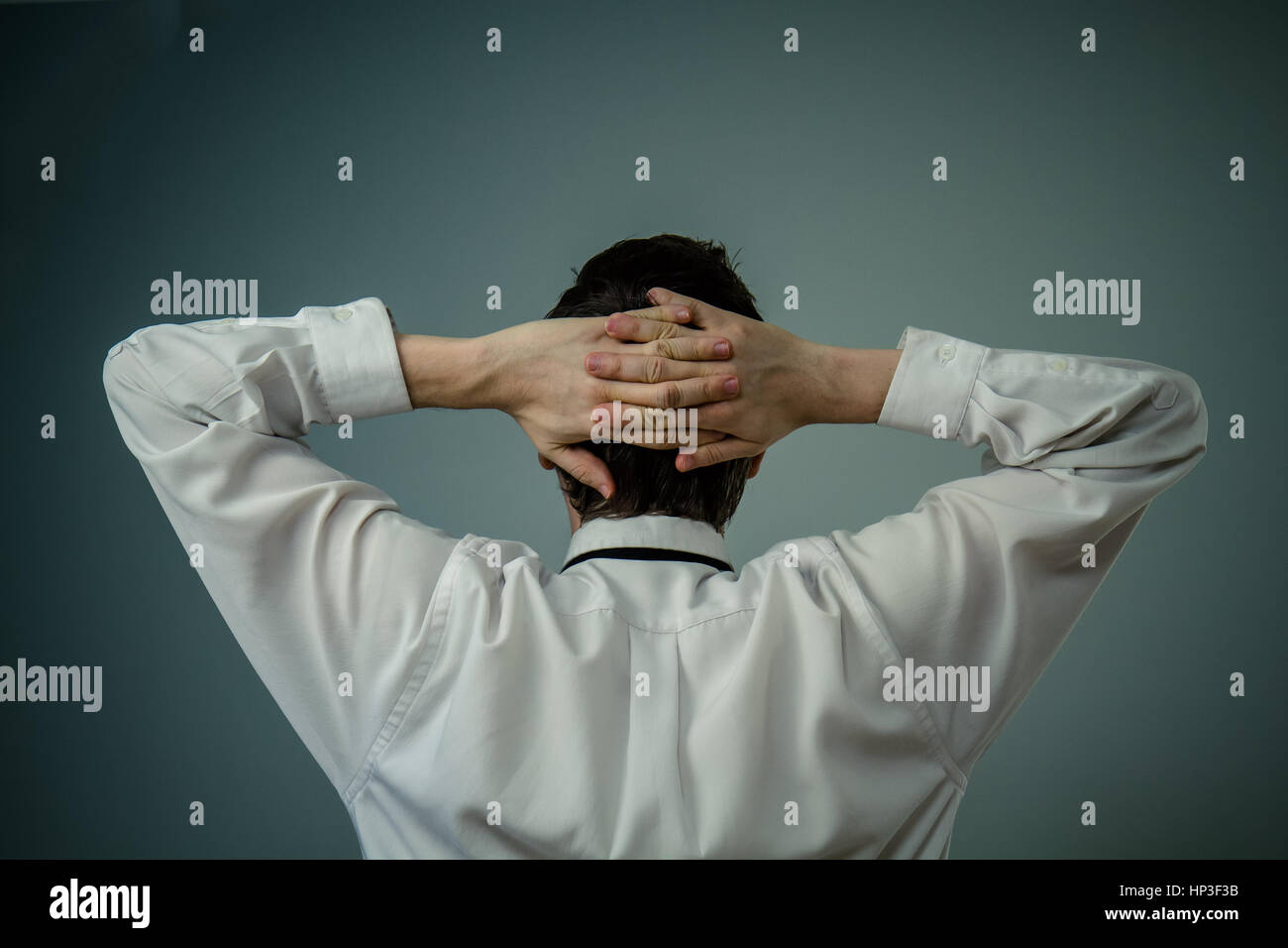 Fingers behind head High Resolution Stock Photography and Images - Alamy