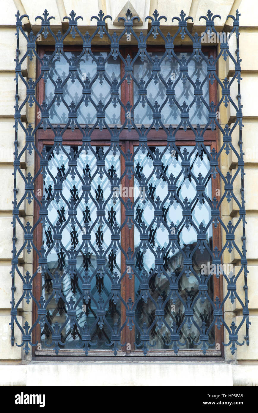 Window with decorative metal grid Stock Photo - Alamy