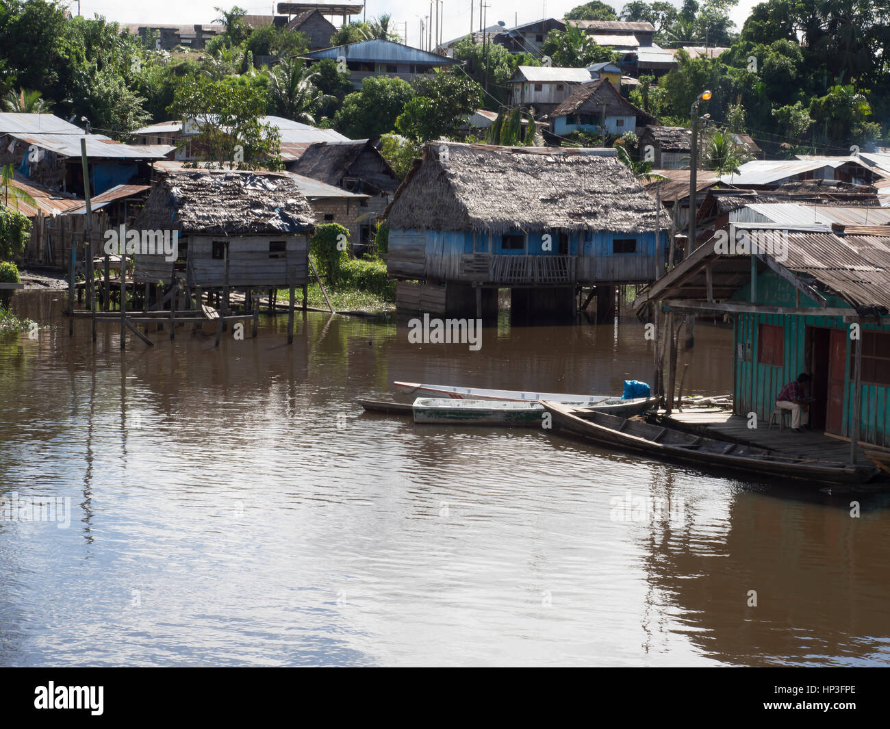 Amazon River, Peru - May 13, 2016: Small village on the bank of the ...