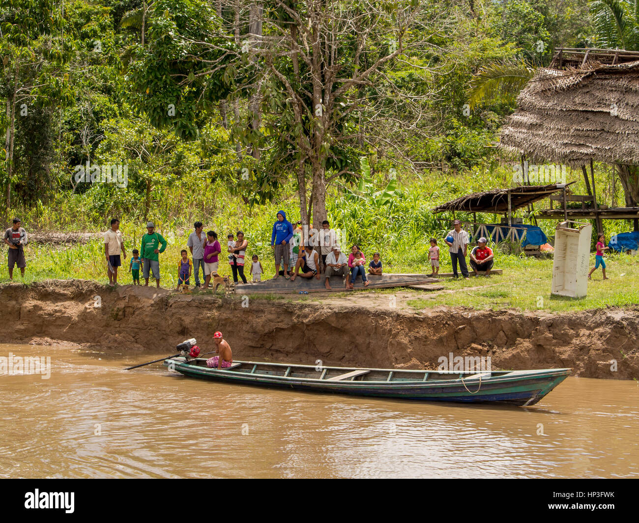 Amazon River, Peru - May 13, 2016: Small village on the bank of the ...
