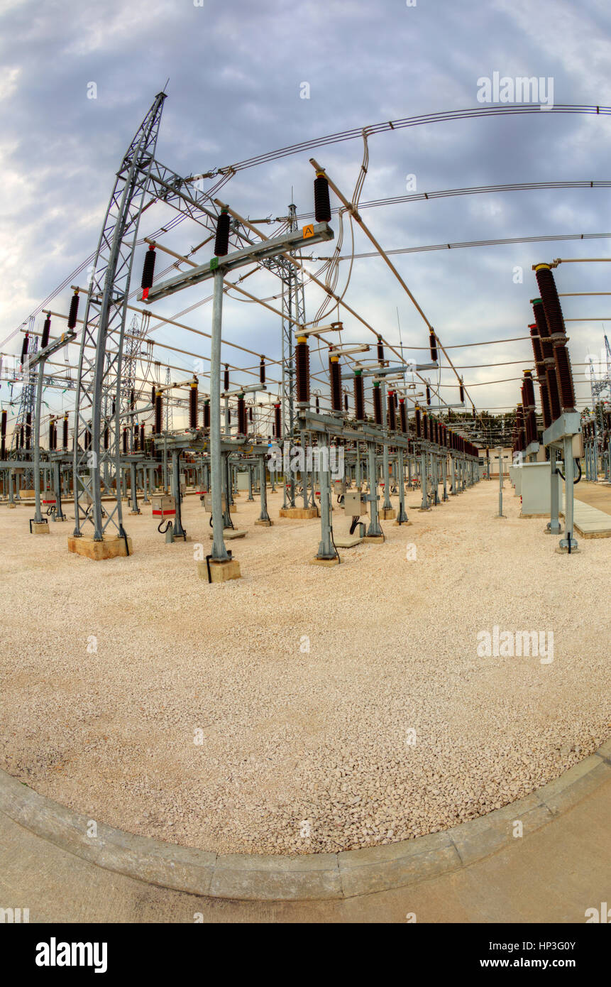 High voltage switchyard in electrical substation in fisheye perspective ...