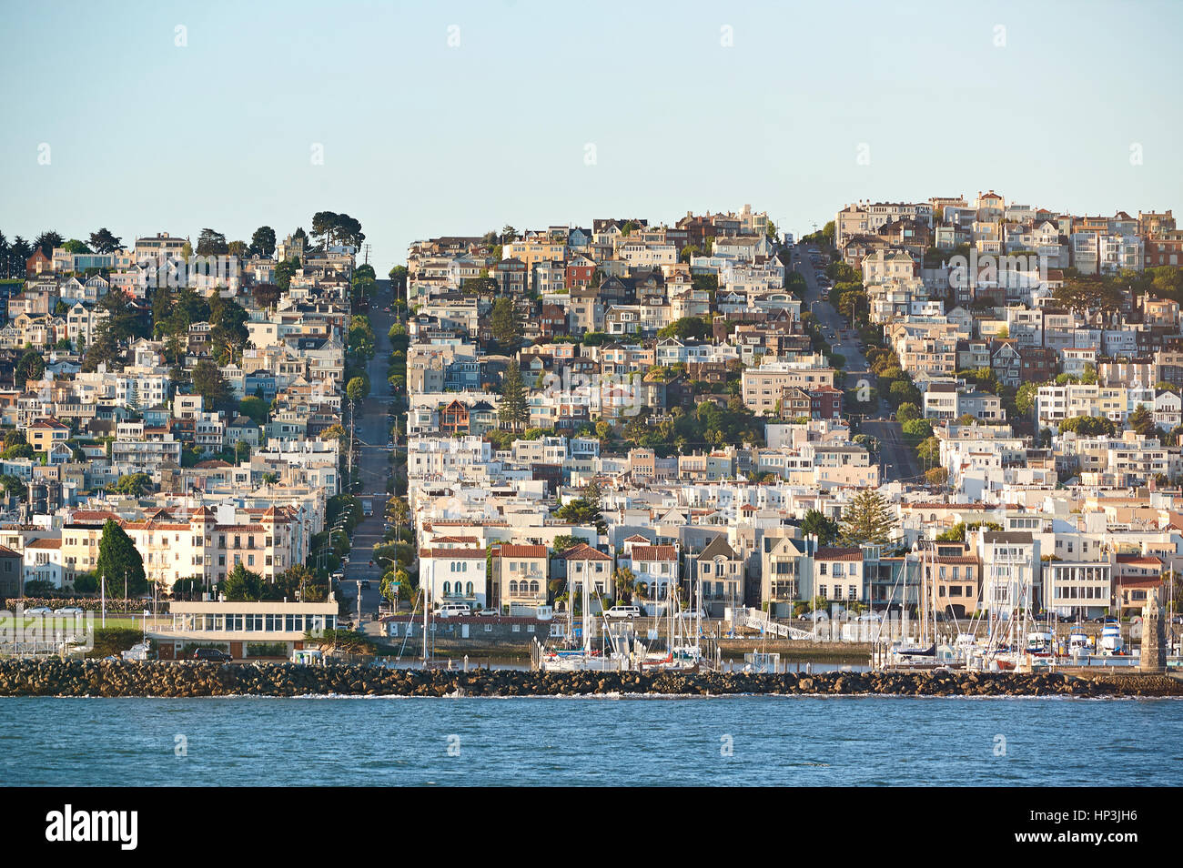 Row of homes in San Francisco view from sea. Coastline with houses in ...