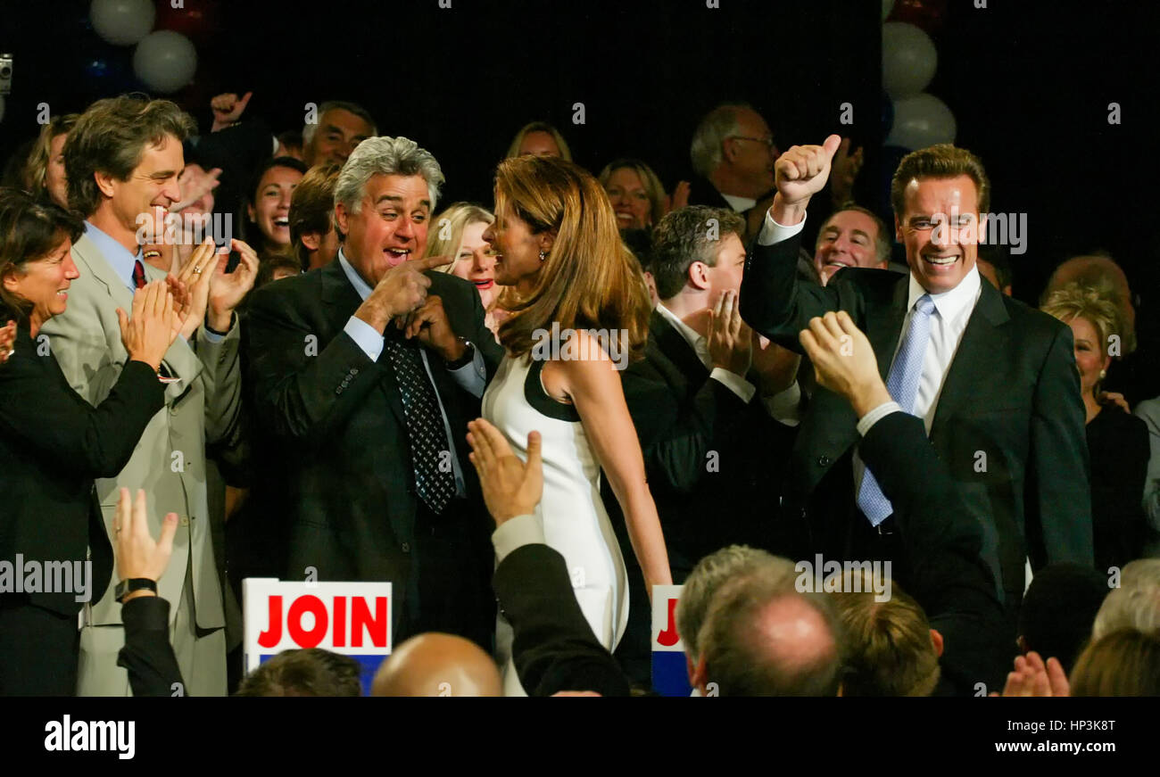 Jay Leno, left, greets Arnold Schwarzenegger and wife Maria Shriver at ...
