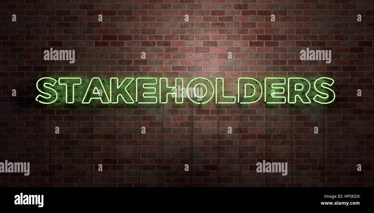 STAKEHOLDERS - fluorescent Neon tube Sign on brickwork - Front view ...