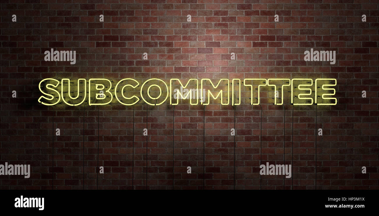 SUBCOMMITTEE - fluorescent Neon tube Sign on brickwork - Front view ...