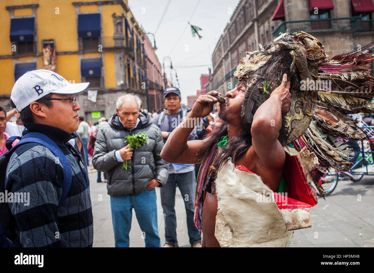 Aztec folk healer, shaman practising spiritual cleansing,Plaza de la ...
