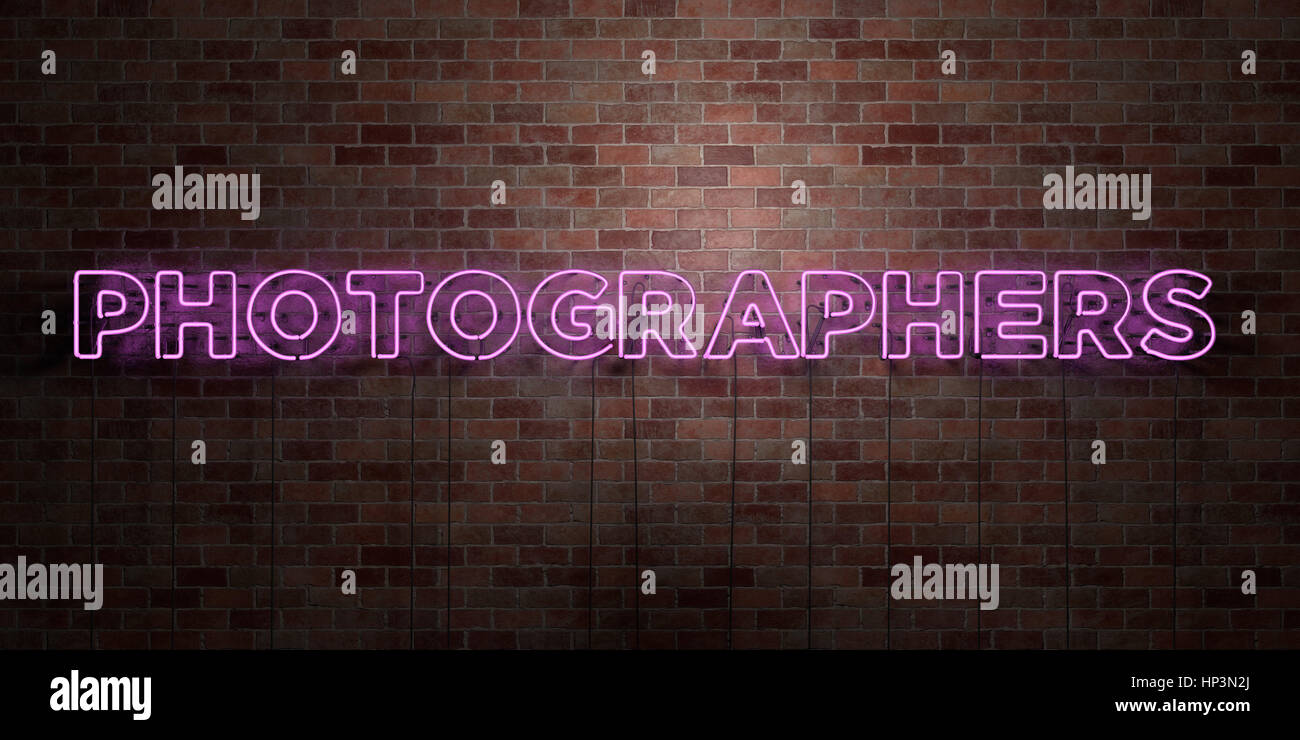 PHOTOGRAPHERS - fluorescent Neon tube Sign on brickwork - Front view ...