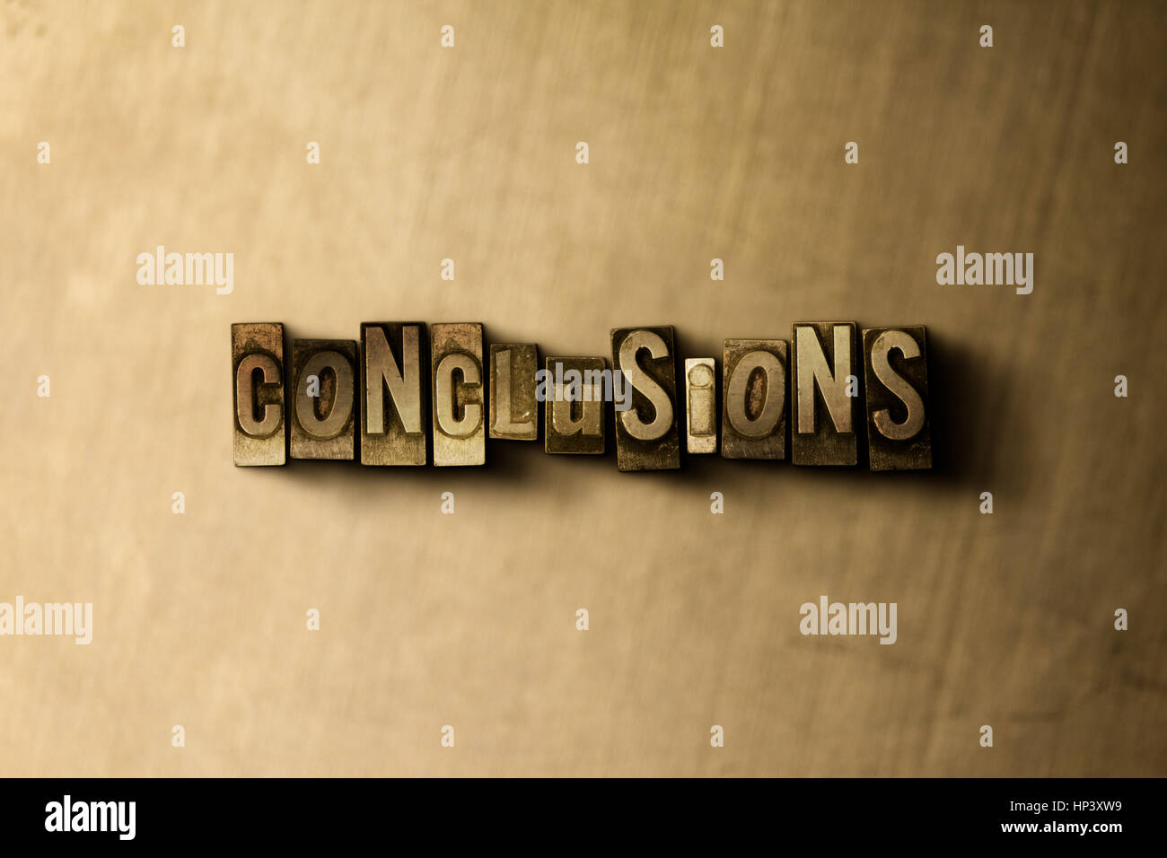 CONCLUSIONS - close-up of grungy vintage typeset word on metal backdrop ...