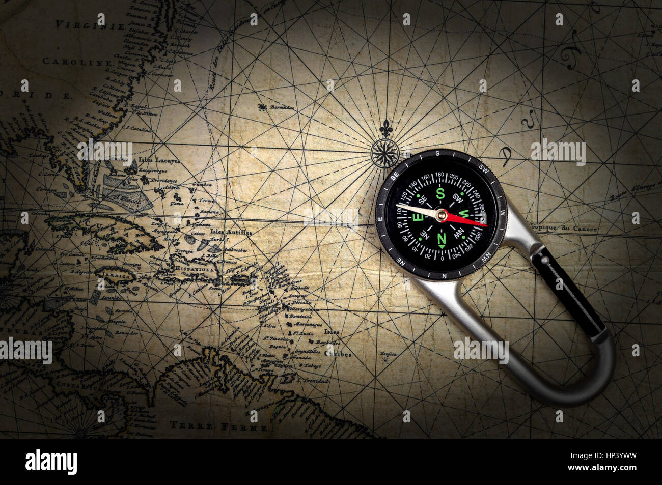 Compass on maps Stock Photo - Alamy