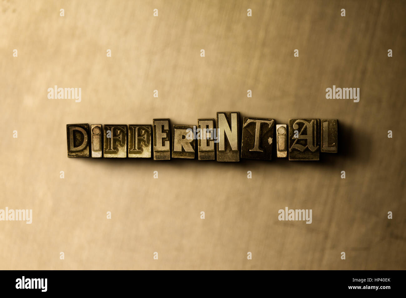 DIFFERENTIAL - close-up of grungy vintage typeset word on metal ...