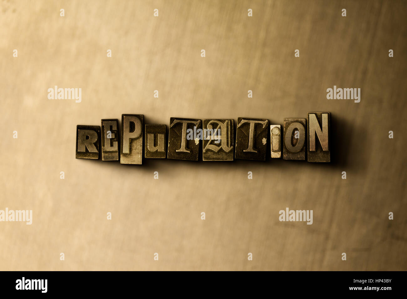 REPUTATION - close-up of grungy vintage typeset word on metal backdrop ...