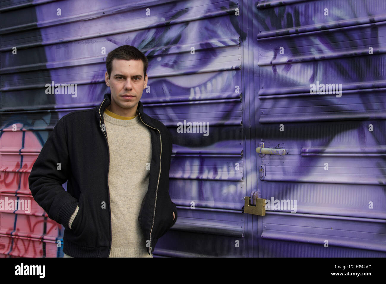 young man front face looking up Stock Photo - Alamy