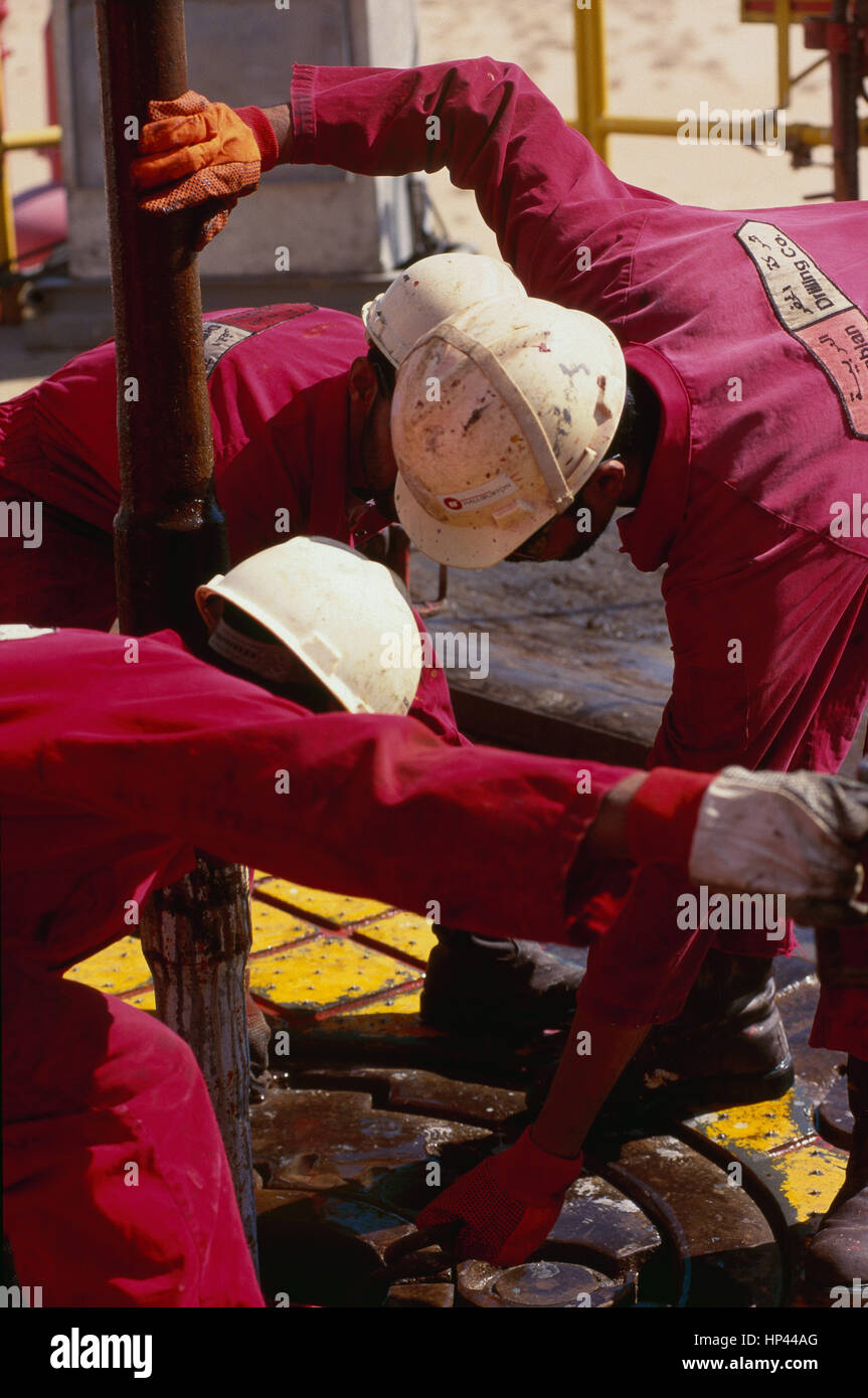Drilling for oil in the Saudi desert near Abqaiq, by the Arabian ...