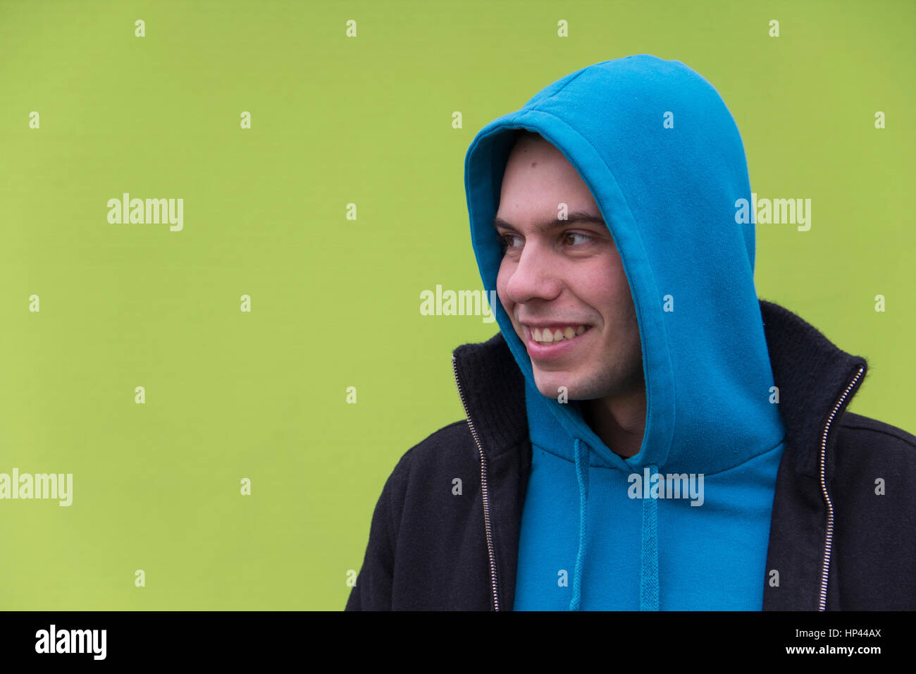 young mn with blue hood Stock Photo - Alamy