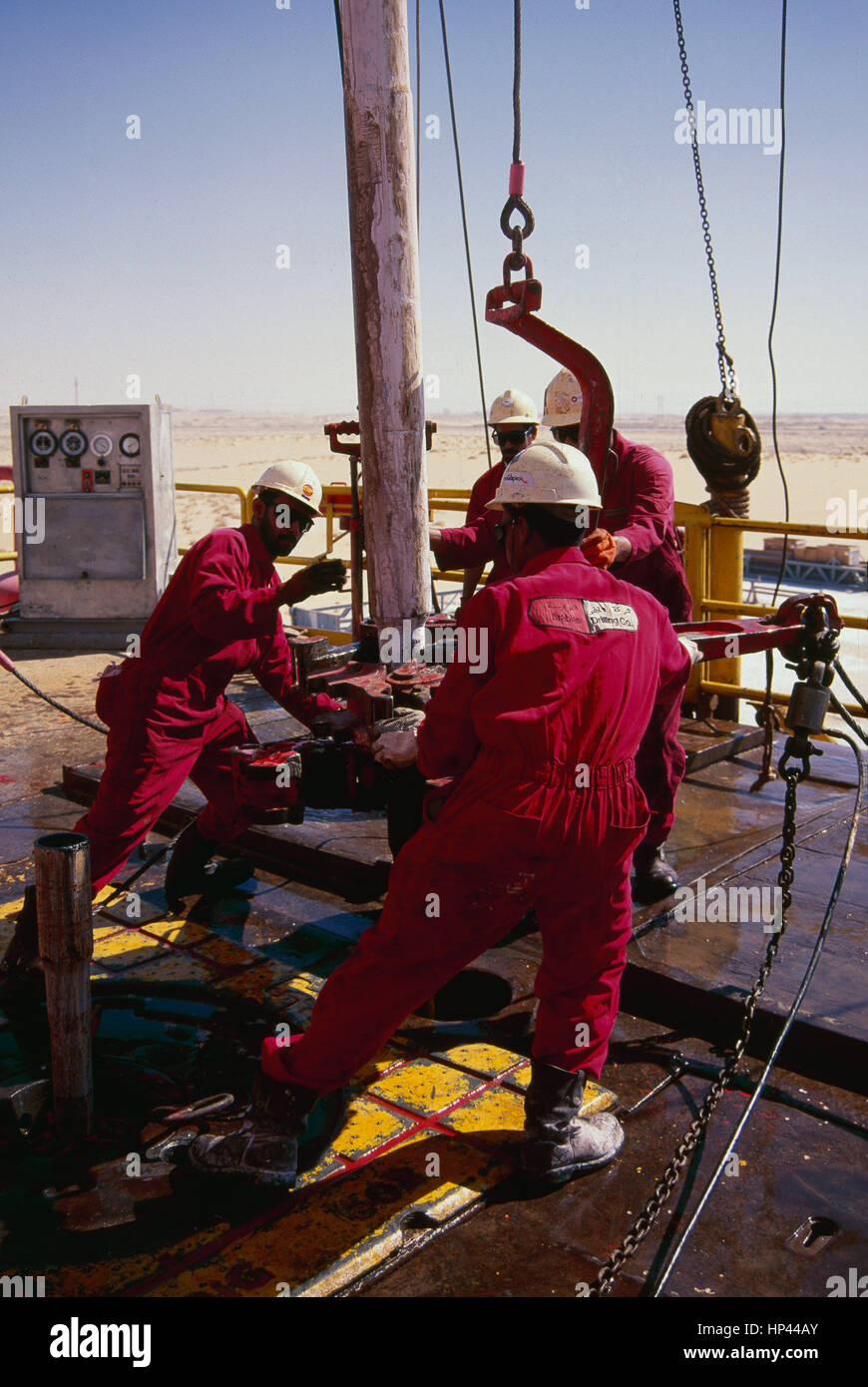 Drilling for oil in the Saudi desert near Abqaiq, by the Arabian ...