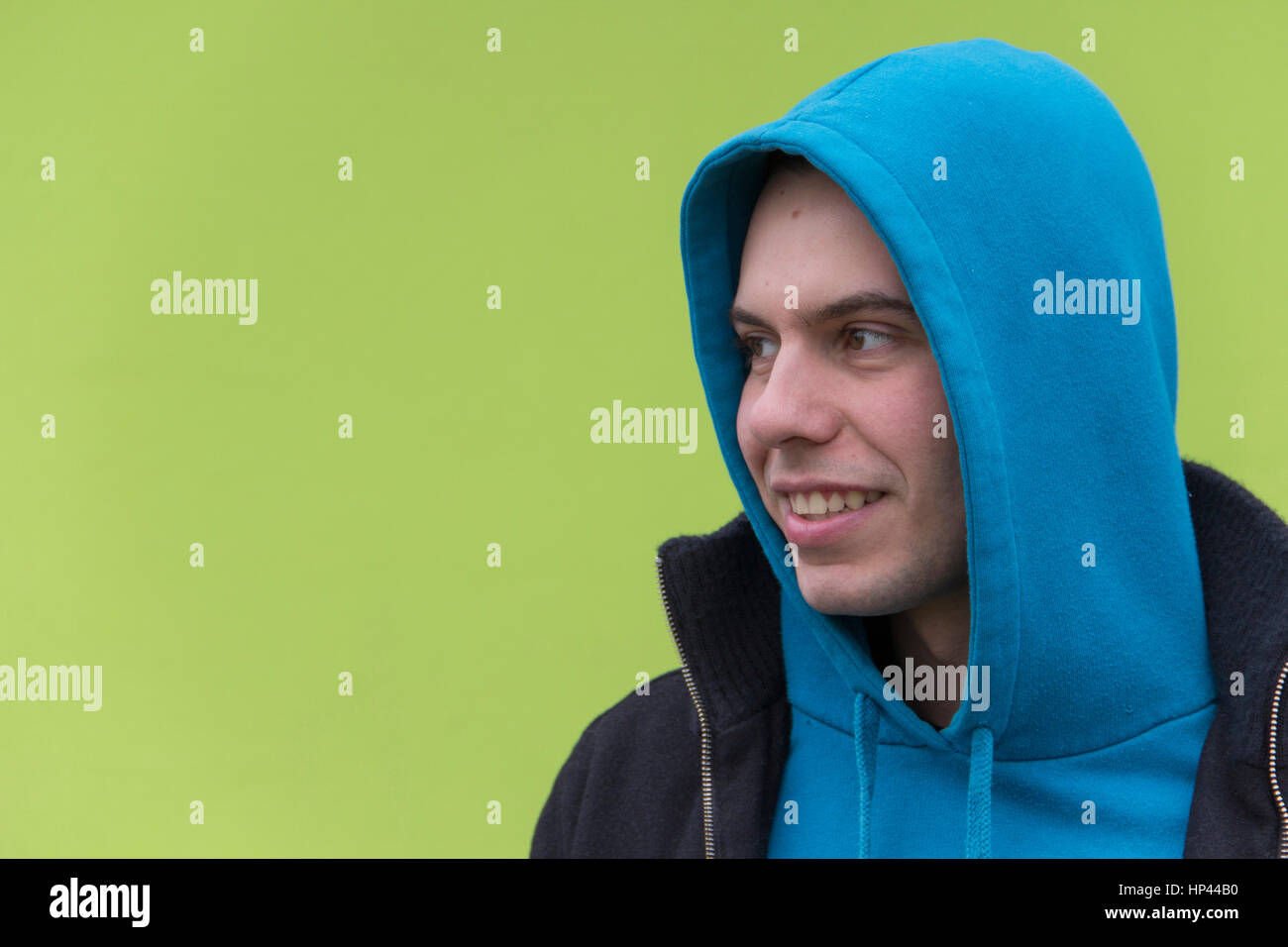 young mn with blue hood Stock Photo - Alamy