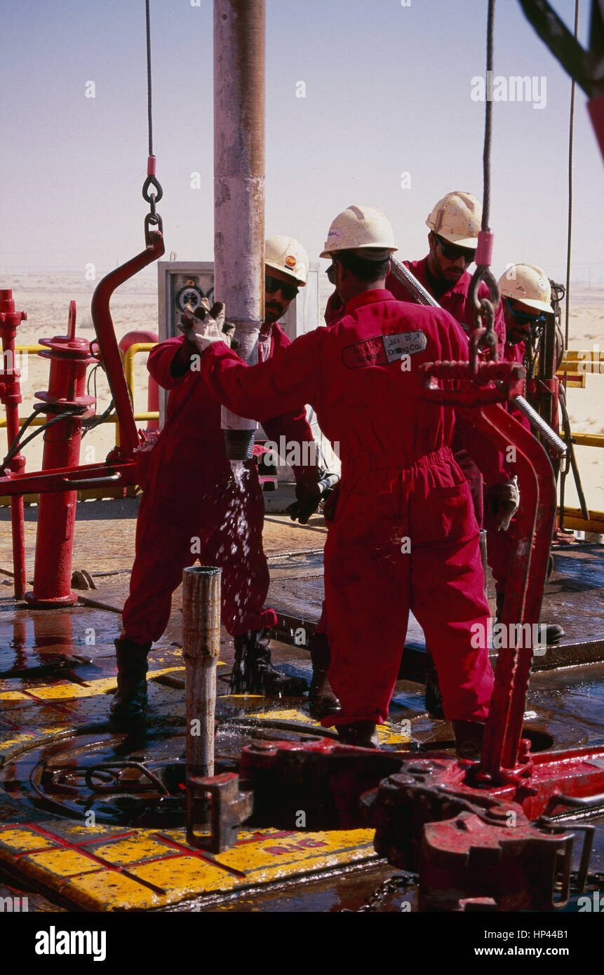 Drilling for oil in the Saudi desert near Abqaiq, by the Arabian ...