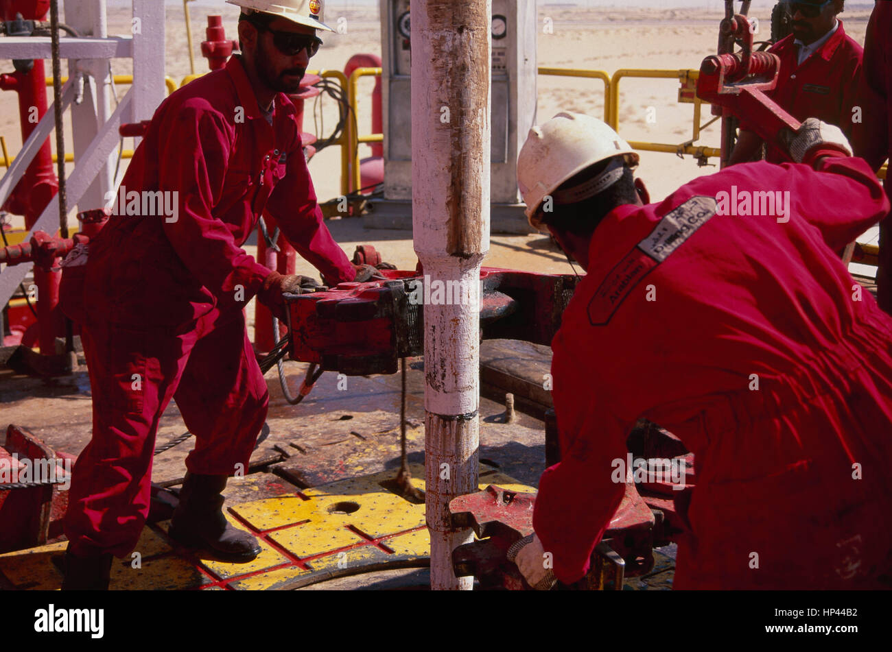 Drilling for oil in the Saudi desert near Abqaiq, by the Arabian ...