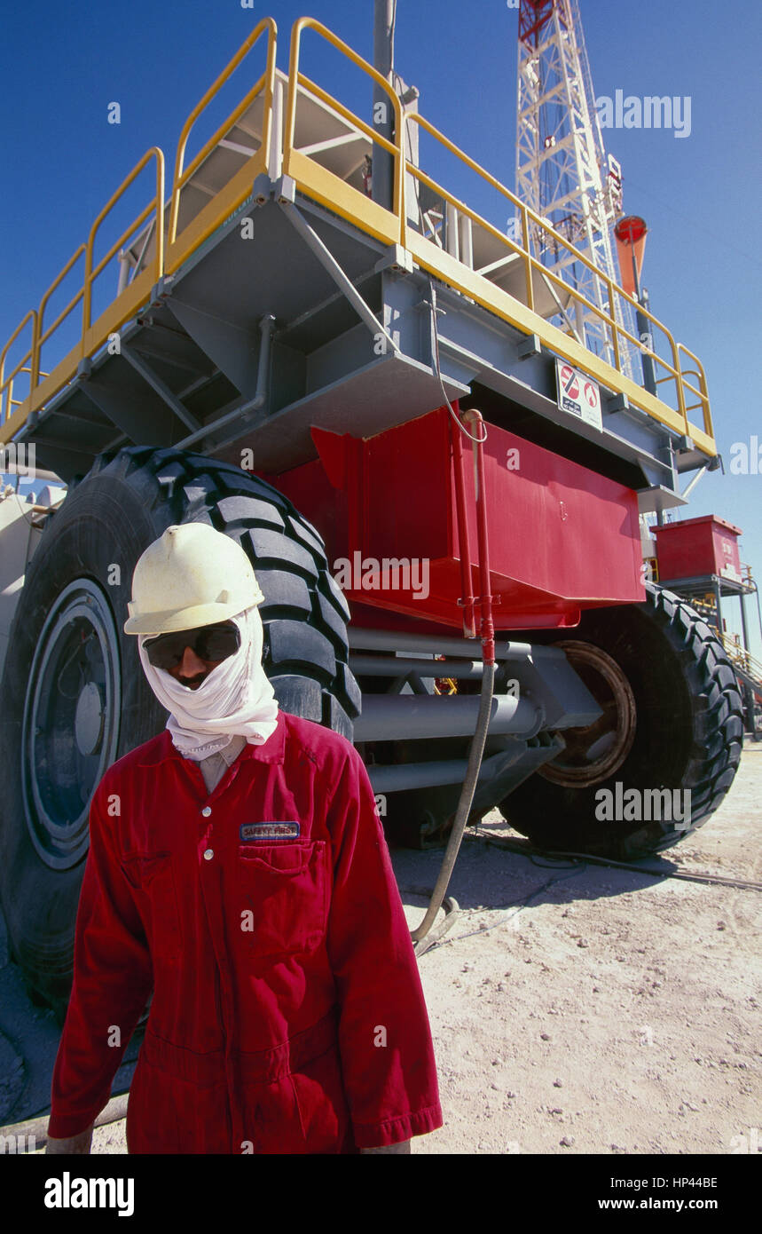 Drilling for oil in the Saudi desert near Abqaiq, by the Arabian ...